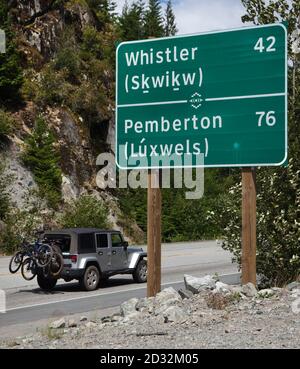 Bilingual road sign in squamish language 1 Stock Photo - Alamy