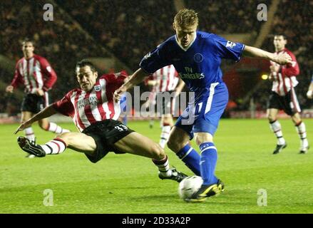 Chelsea's Damien Duff (right) is challenged by Blackburn's Garry ...