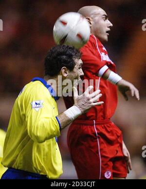 Middlesbrough's Massimo Maccarone battles for the ball with Arsenal's ...