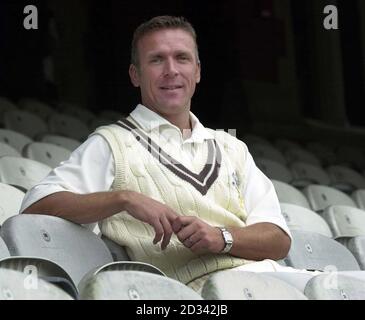 Former England and Surrey cricketer Alec Stewart stands with his wife ...
