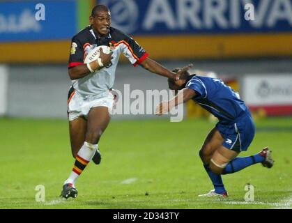 Bradford Bulls' Leon Pryce (left) and Jamie Peacock tackle London ...