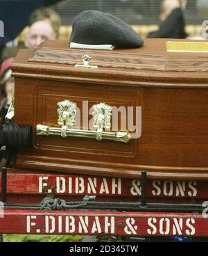 The coffin of celebrity steeplejack Fred Dibnah passes an old mill as ...
