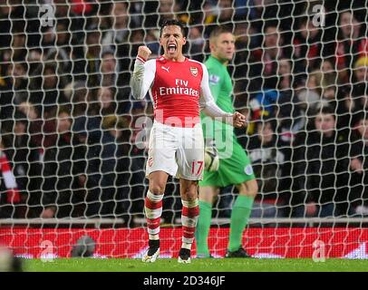 Arsenal's Alexis Sanchez scoring his sides third goal during the ...