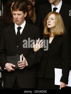 Gaynor Cook with robin cooks son Chris at Robin Cook's Funeral at St ...