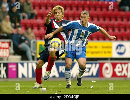 West Bromwich Albion's Junichi Inamoto challenges Sunderland's Anthony ...