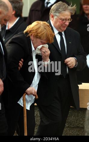 Liz and Ken Norris leave the funeral of their daughter Lisa at South ...