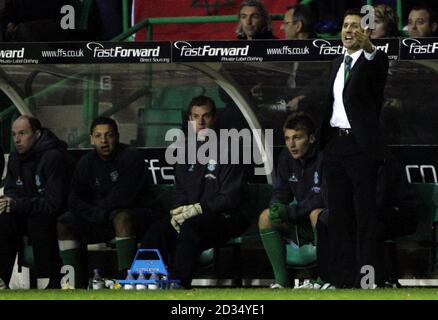 Hibernian manager John Collins gestures to his players during the ...