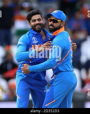 India's Ravindra Jadeja celebrates the wicket of England's Joe Root ...
