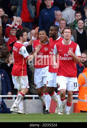 Arsenal's Cesar Julio Baptista (c) celebrates after scoring the opening ...