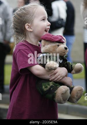 Ella Louise Pinkney, 4, waits for her father, Corporal Andrew Pinkney ...