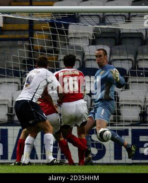 Preston's Chris Brown (right) scores during the Coca-Cola Championship ...