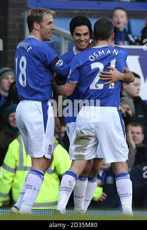 Everton's Phil Neville and Leon Osman lifts the Roar against Racism Cup ...