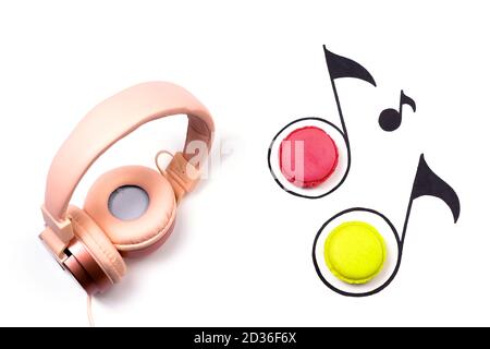 Sweet music creative background. Macaroon and hand drawn music notes on ...