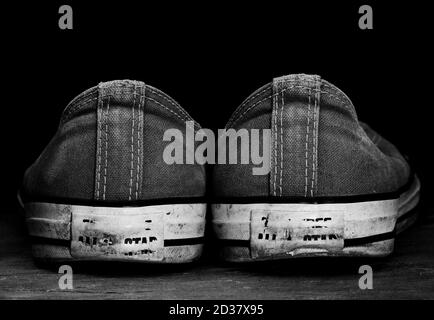 Old trainers. Worn out shoes Stock Photo - Alamy