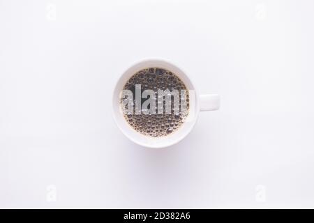 Overhead shot of eastern coffee in a white cup on a white surface Stock ...