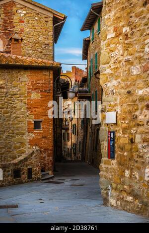 Little square in the medieval center of the white village of Cisternino ...