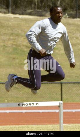 Former Olympic Gold Medalist Linford Christie accompanied by his ...