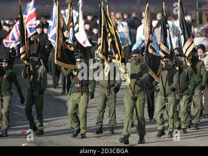 Masked members of the Ulster Defence Association (UDA) on parade in ...