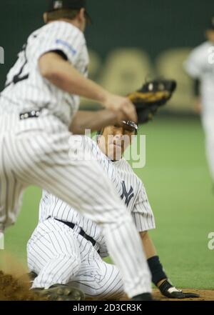 TOKYO, Japan - Japan's third baseman Shuichi Murata hits a three-run ...