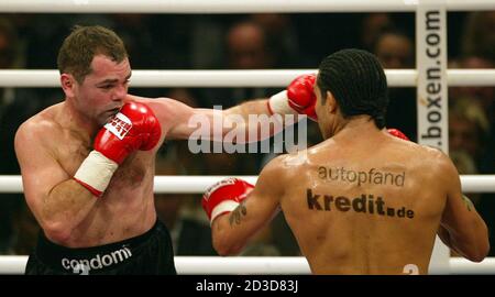 Great Britain's Robin Reid, left, and Germany's Sven Ottke, right ...