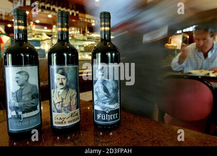 Red wine bottles with labels depicting Adolf Hitler, Karl Marx, Erwin ...