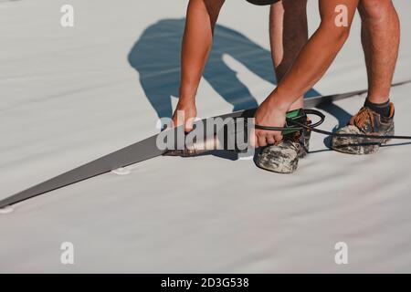 Worker welding pvc roof membrane by heater with welder machine Stock ...