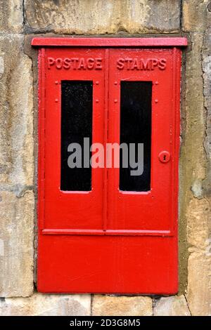 Closeup of antique red door panels with ornate frames and baroque metal ...