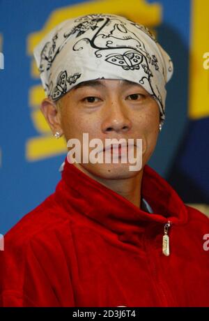 Hong Kong singer and actor Jordan Chan, right, and his actress wife ...