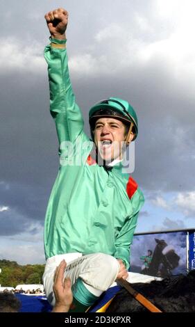 French jockey Christophe Soumillon, riding Zarkava, gestures to edias ...