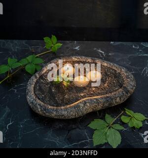 natural stone bowl handcrafted with spices Stock Photo - Alamy