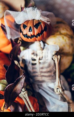 Pumpkins and skeleton pumpkin bride Stock Photo - Alamy