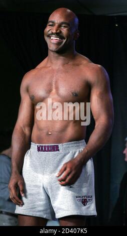 Four time Heavyweight champion Evander Holyfield was knocked down in ...