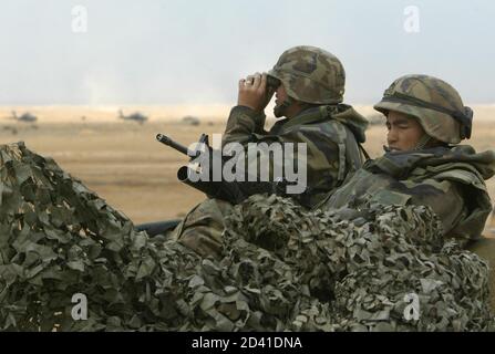 Two NBC defense soldiers in protective gear, pictured during ...
