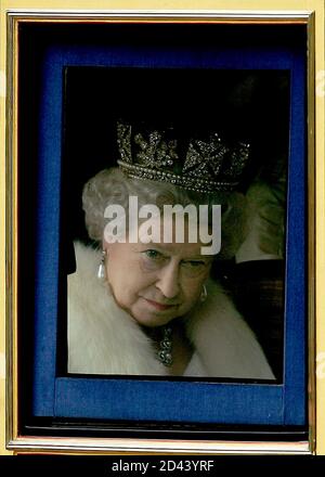 Queen Elizabeth II looks out of the window of Buckingham Palace, in ...