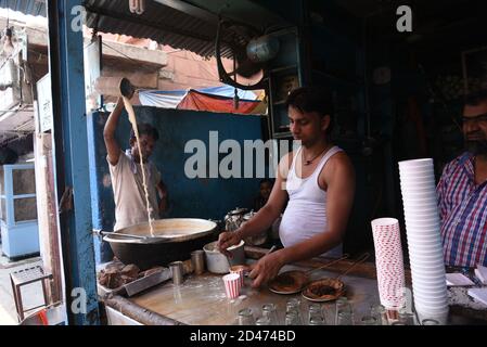 Old Delhi Indian men selling street food Indian chaiwala popular ...