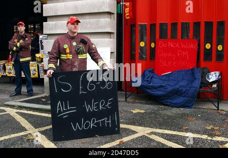 Firefighters man a picket line in Belfast as part of a nationwide 24 ...