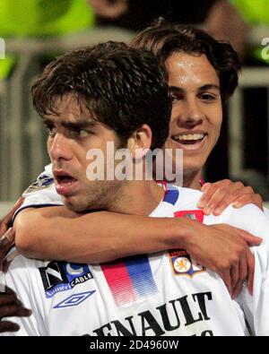 Lyon players celebrate after Lyon's French forward Gomis Bafetimbi ...