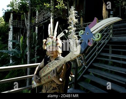 Traditional Orang Ulu longhouse in the Sarawak Cultural Village on ...