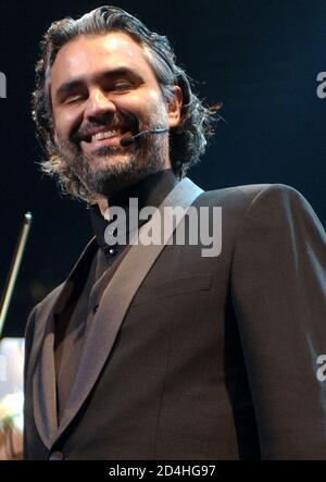 Blind Italian tenor Andrea Bocelli sings at Modena's Romanesque ...