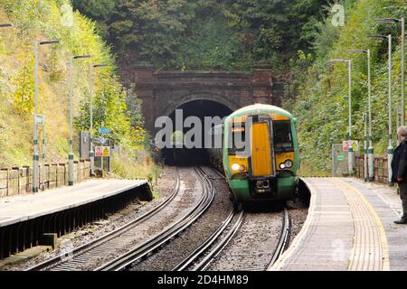 Riddlesdown station early morning with empty platforms waiting for a ...