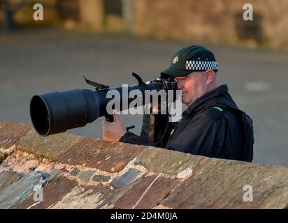 male PSNI police service northern ireland sergeant on patrol with ...