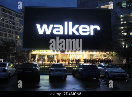 A huge screen shows the logo Walker on a shopping mall building in ...