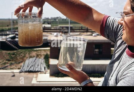 Clean and dirty water samples in test tube Stock Photo - Alamy