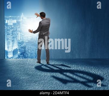 Businessman casting dollar shape shadow in business concept Stock Photo ...
