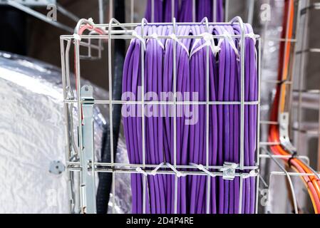 Electrical conduits system. Metal pipeline installed on ceiling wall of ...