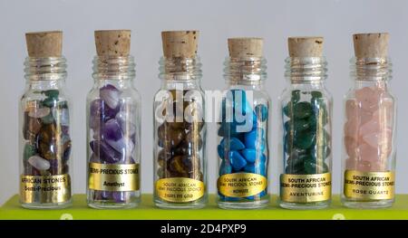 Small sample bottles with a selection of tumbled and polished South ...