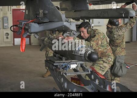A weapons load crew team chief assigned to the 9th Expeditionary Bomb ...
