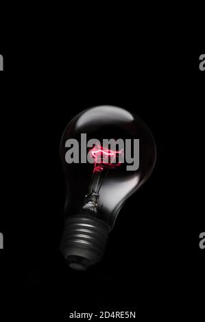 halogen light bulb with filament glowing Stock Photo - Alamy