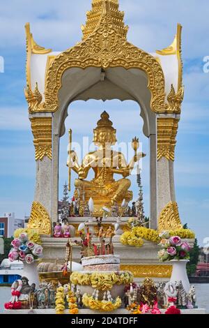 A four-headed statue of HIndu god Brahma in front of the Dhevasathan ...