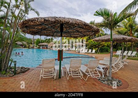 The main swimming pool at the Outriggers Fiji Beach Resort near ...